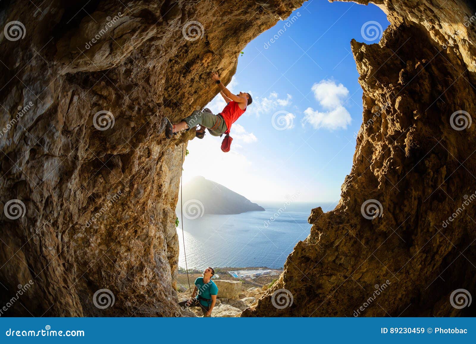 Rock climbers in cave stock image. Image of male, nature - 89230459