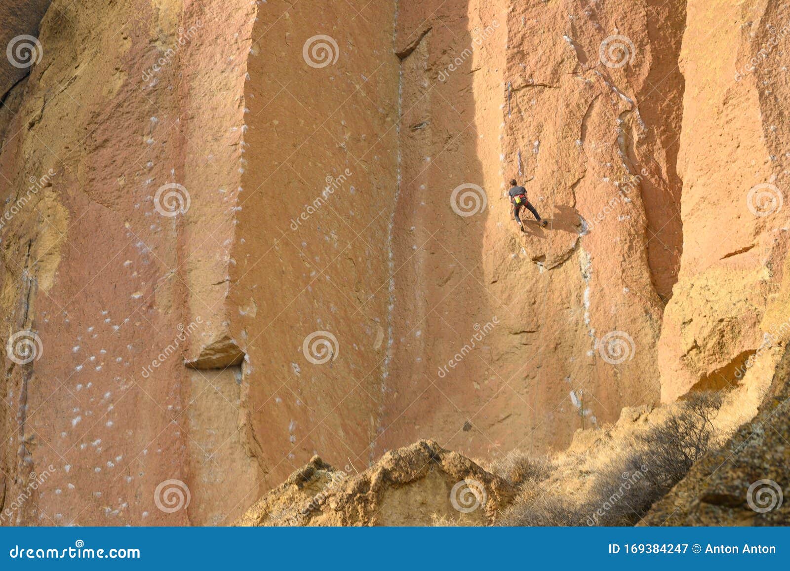 Rock Climbers Climb a Large Rock, Filmed from the Back Stock Image ...