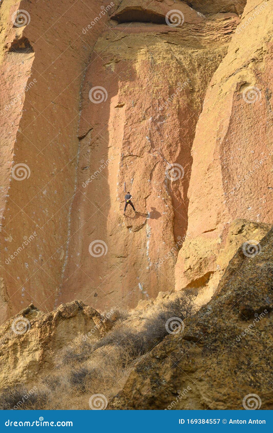 Rock Climbers Climb a Large Rock, Filmed from the Back Stock Image ...