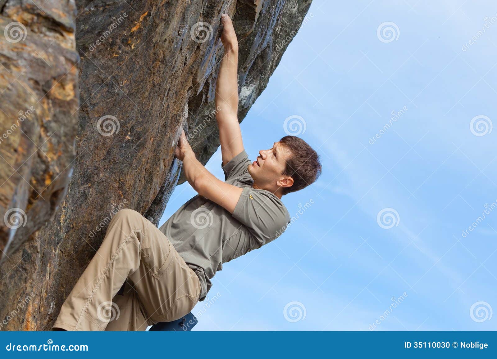 Rock climbing outdoors stock photo. Image of muscular - 35110030