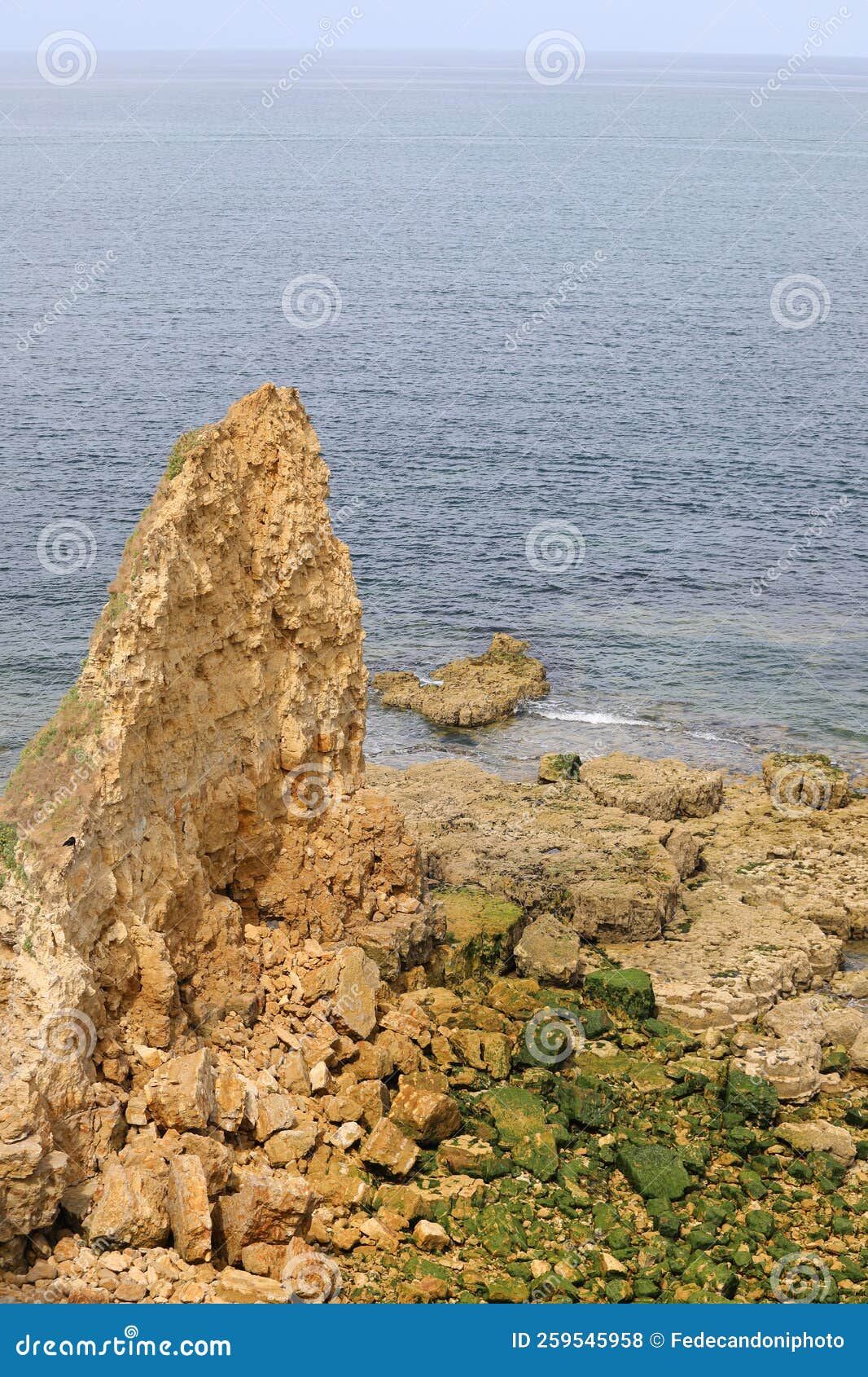 Rock Collapsed Due To Erosion Due To Wave Motion Stock Photo - Image of ...