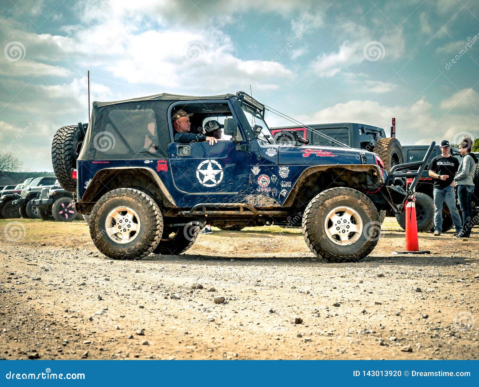 Orange Jeep Rock Crawling editorial image. Image of jeeps - 143013920