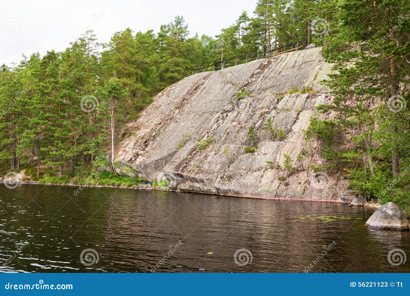 Rock Face at a lake stock image. Image of mountain, stone - 56221123