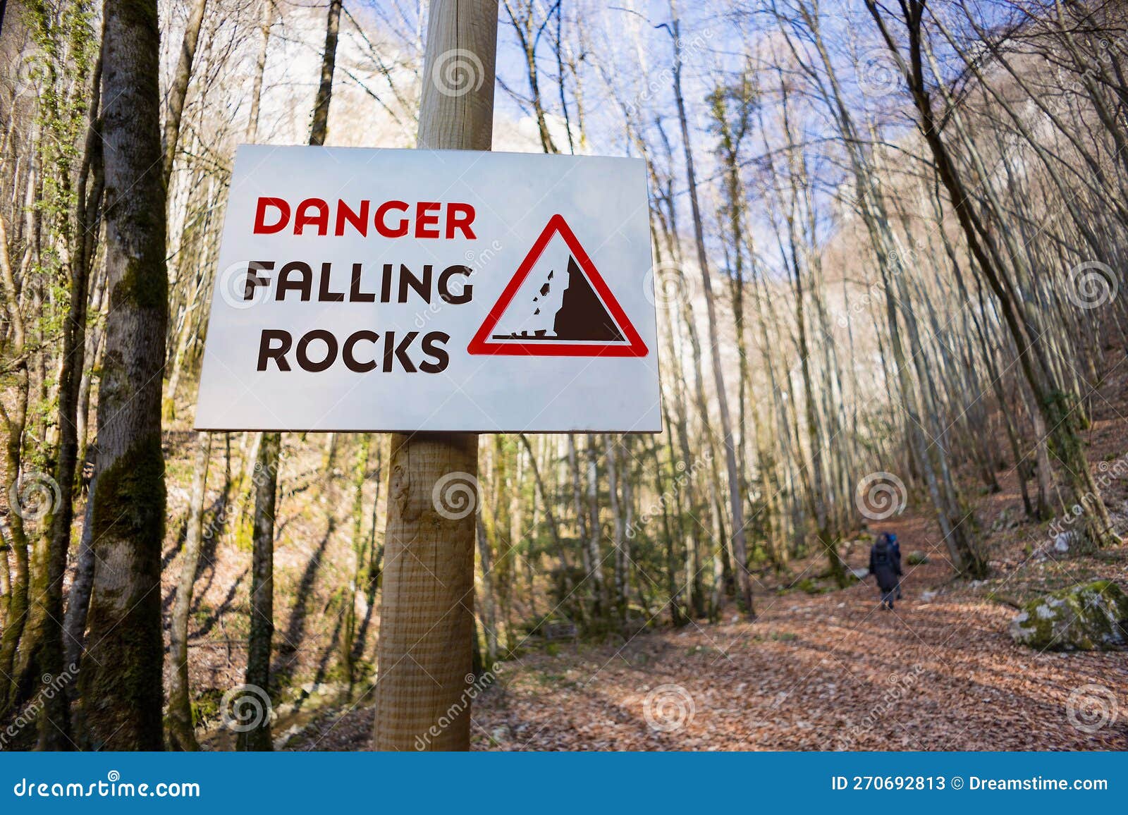 Rock Fall Danger Sign in the Forest People Walks Away Stock Image ...