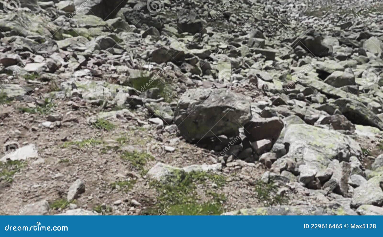A Rock Falling Down a Slope Causes a Rockfall Stock Video - Video of ...