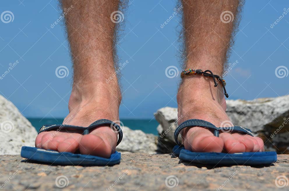 Rock Feet stock photo. Image of legs, jandals, seaside - 27438124