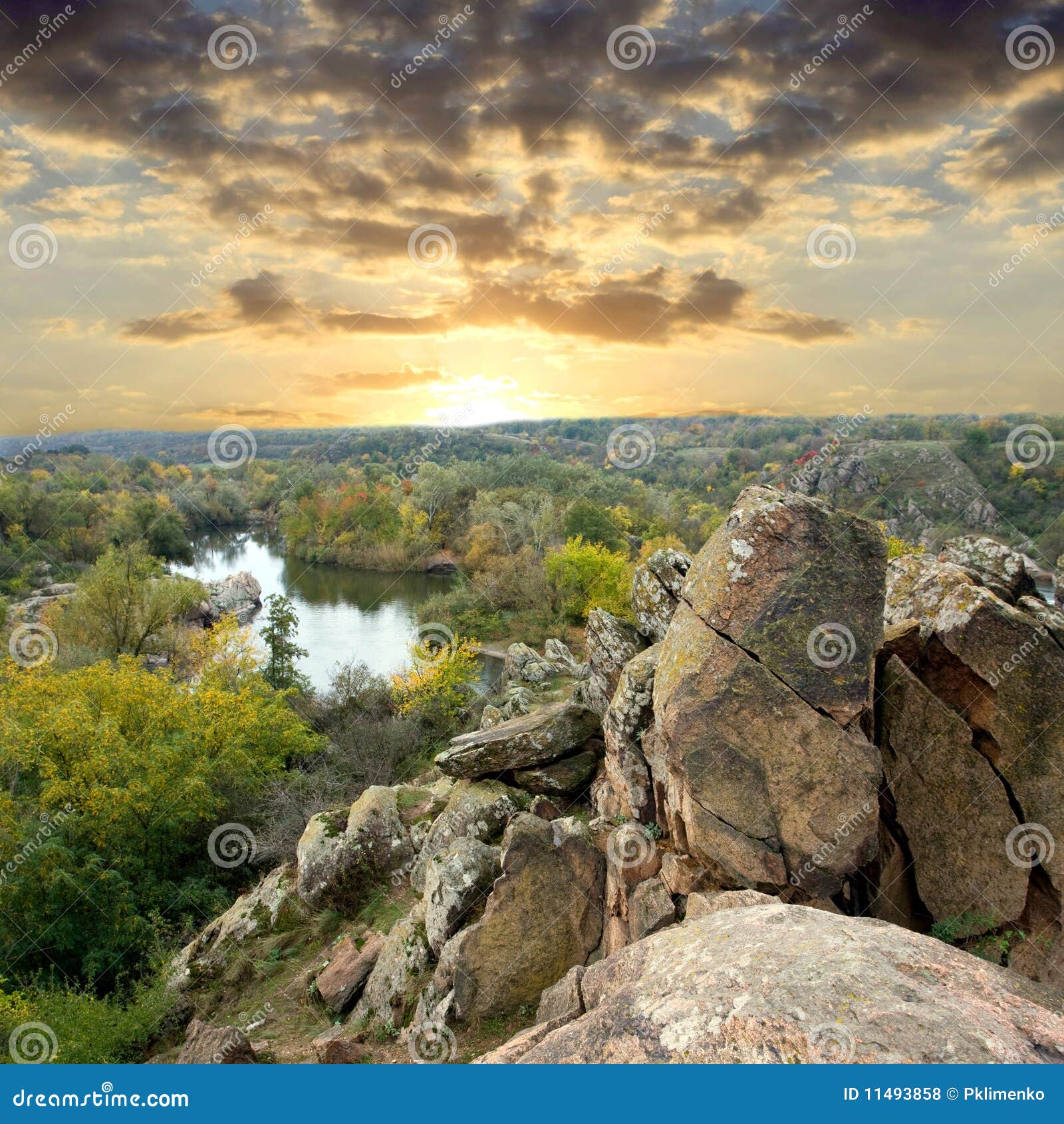 Rock in forest at sunset stock photo. Image of clouds - 11493858
