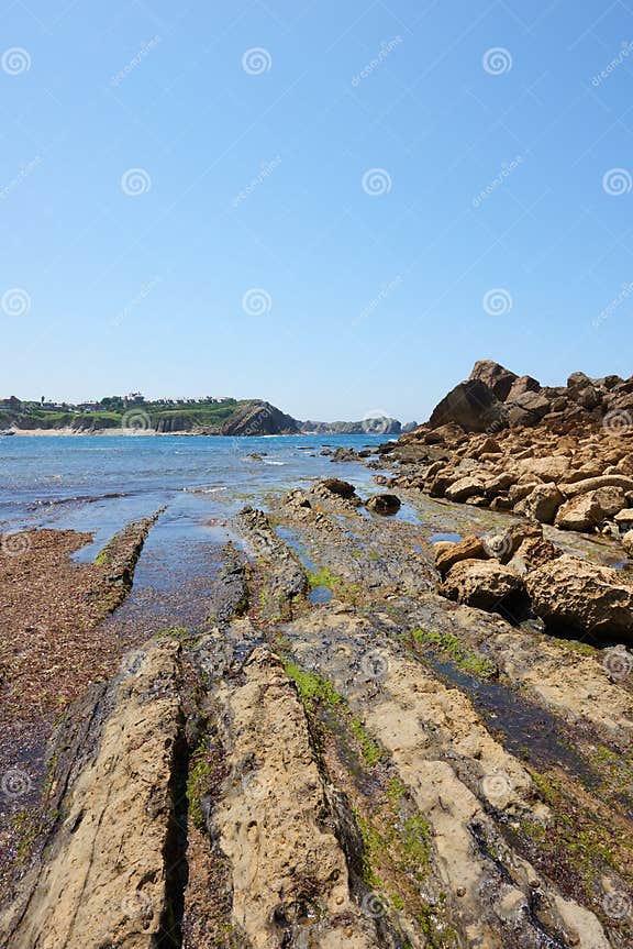 Rock Formations in Front of Cliffs in Northern Spain Stock Image ...