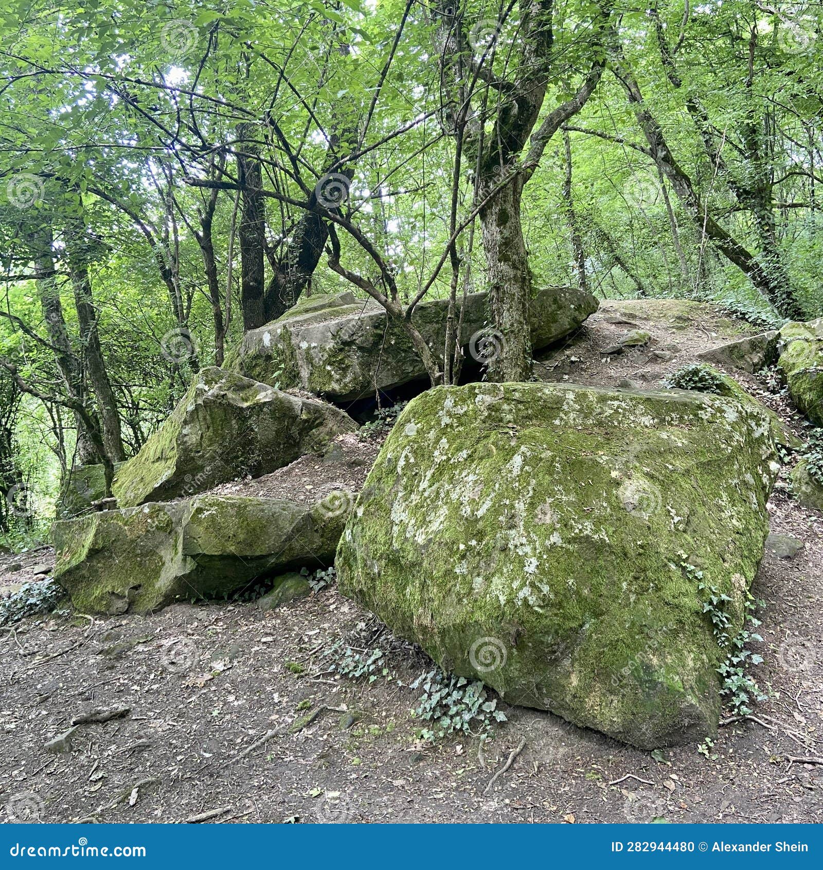 Rock Fragments Covered with Moss, Possibly Destroyed Dolmen Stock Photo ...