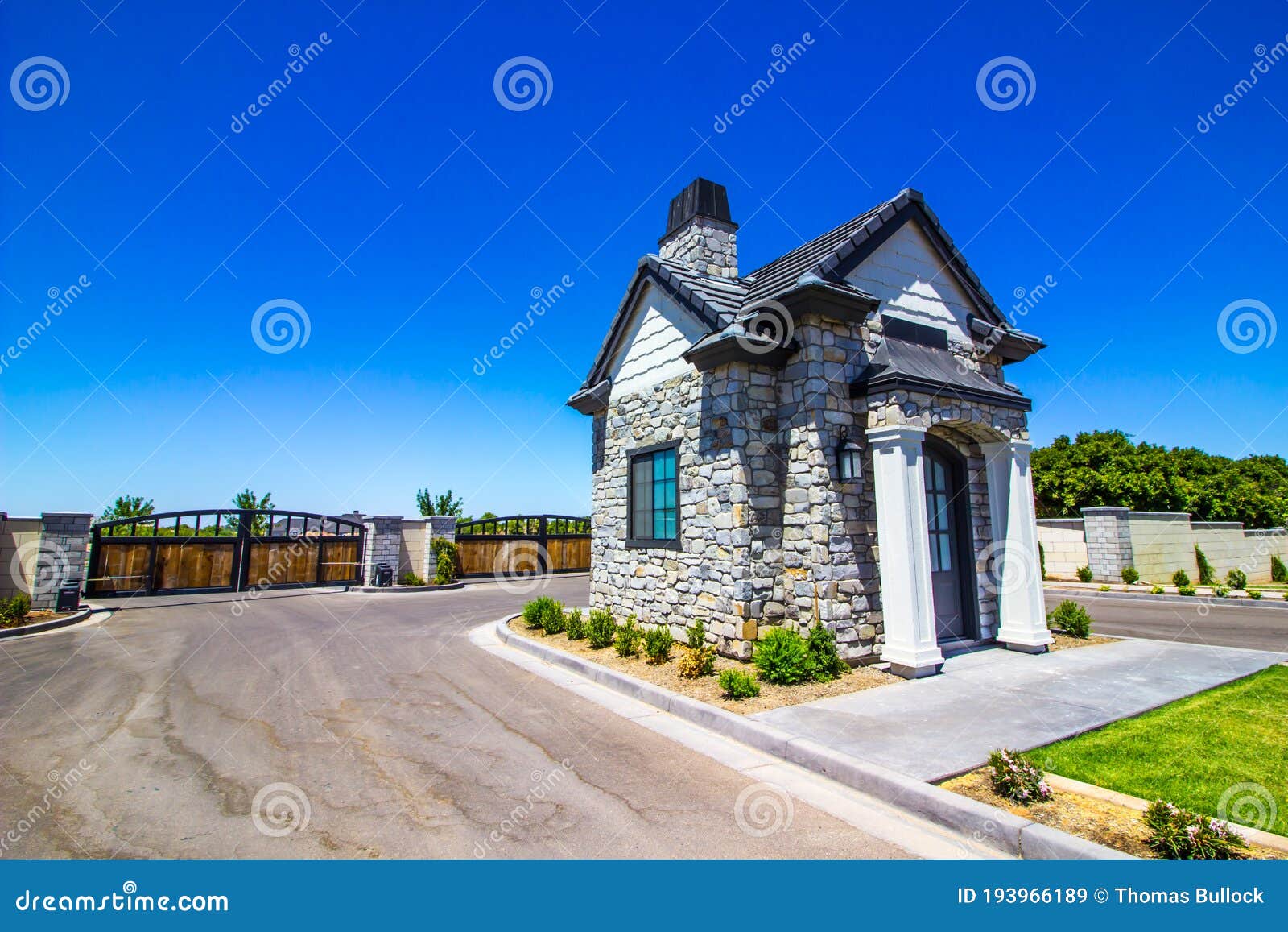 Rock Gate House & Wooden Gate Entrance Stock Image - Image of gates ...