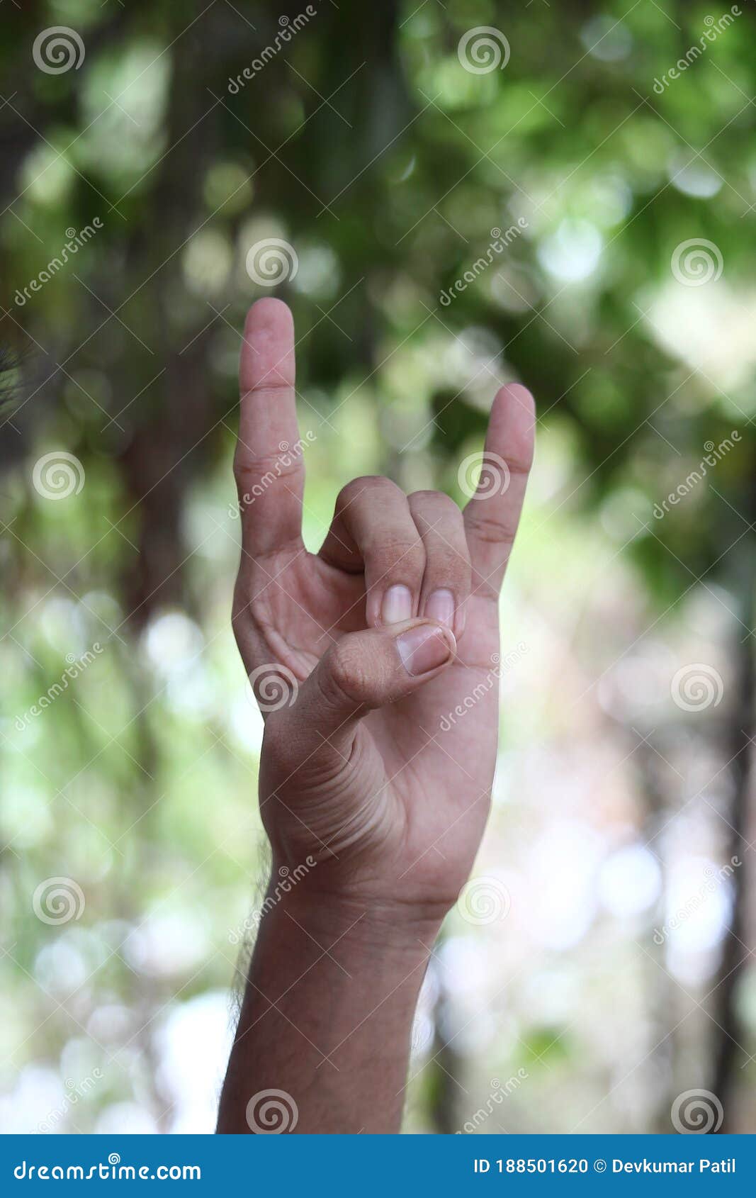Rock hand gesture image stock photo. Image of yellow - 188501620