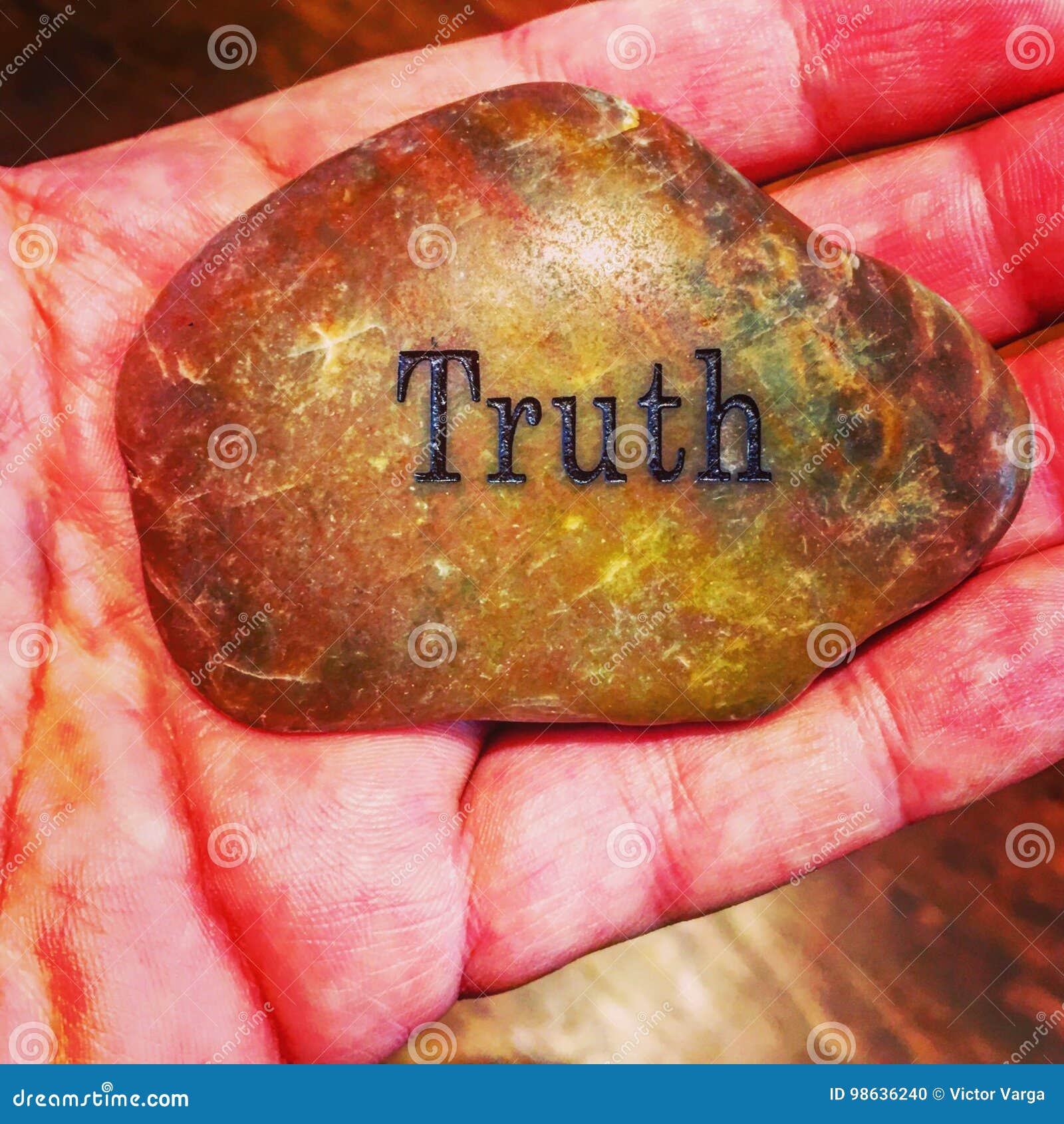 Rock in hand of truth stock photo. Image of rock, colorful - 98636240