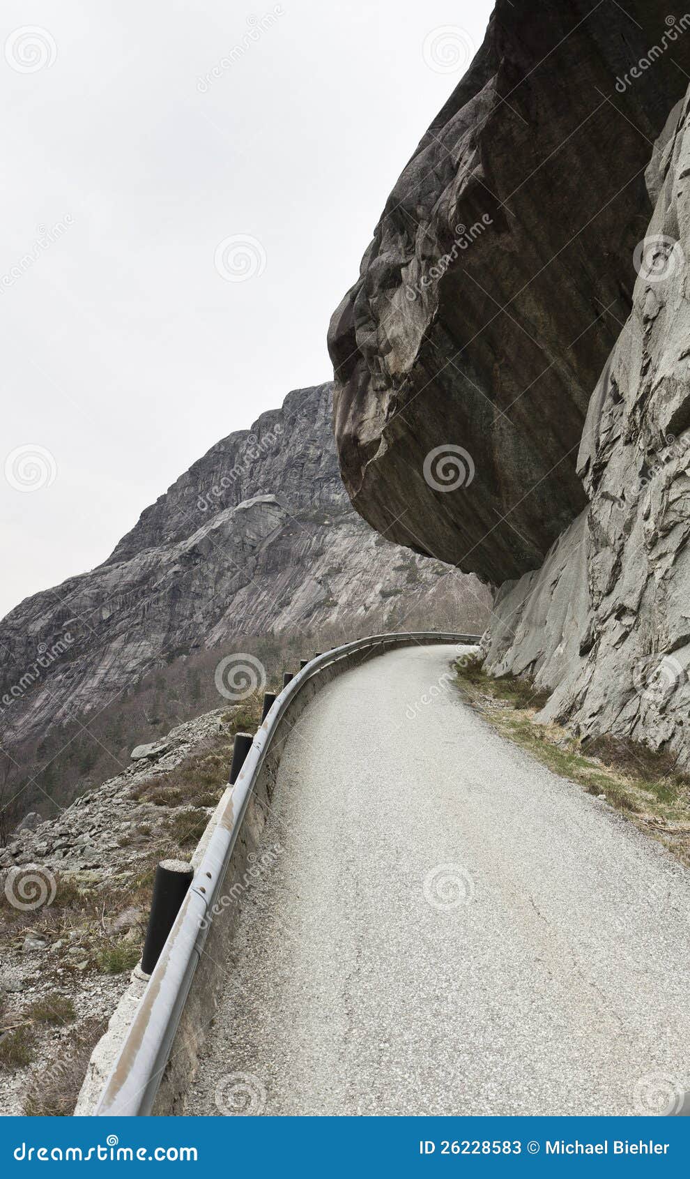 Rock hanging over road stock image. Image of outdoor - 26228583