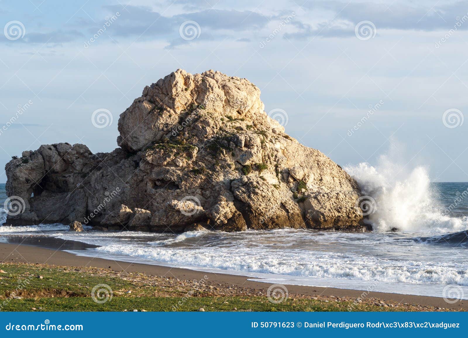 Rock hit by the sea stock image. Image of beach, purple - 50791623