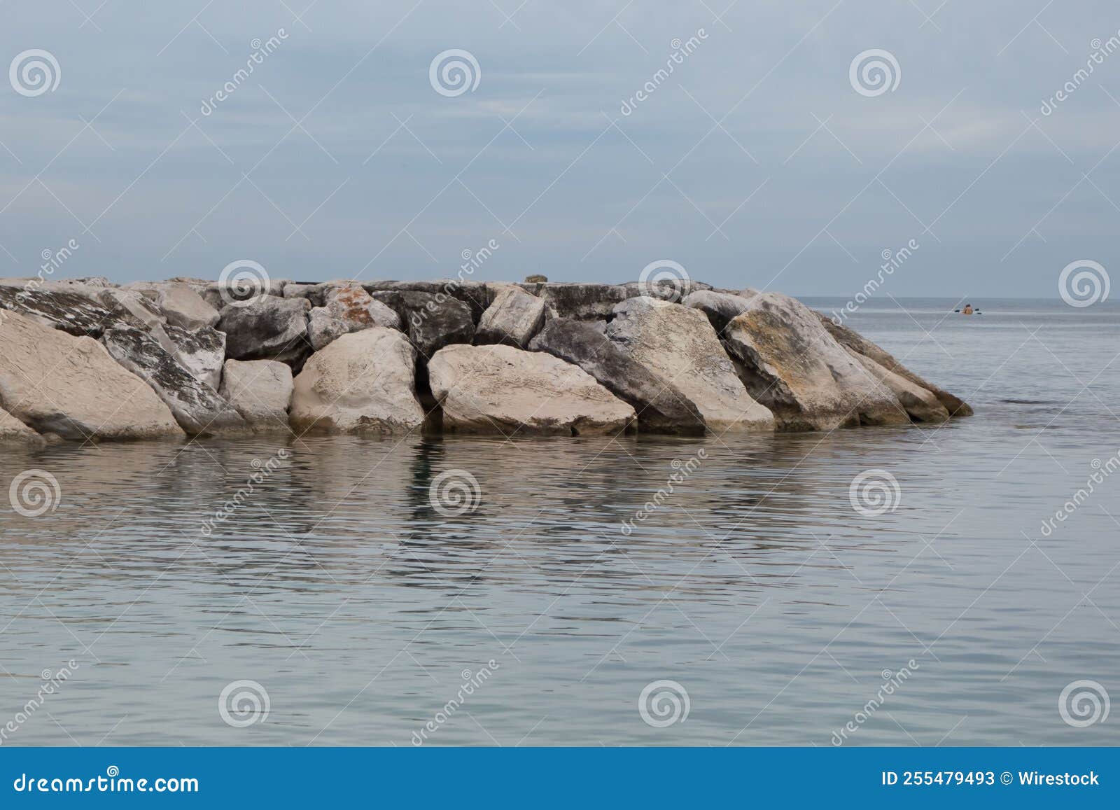 Rock Jetty by the Beach Under Blue Sky Stock Image - Image of peaceful ...