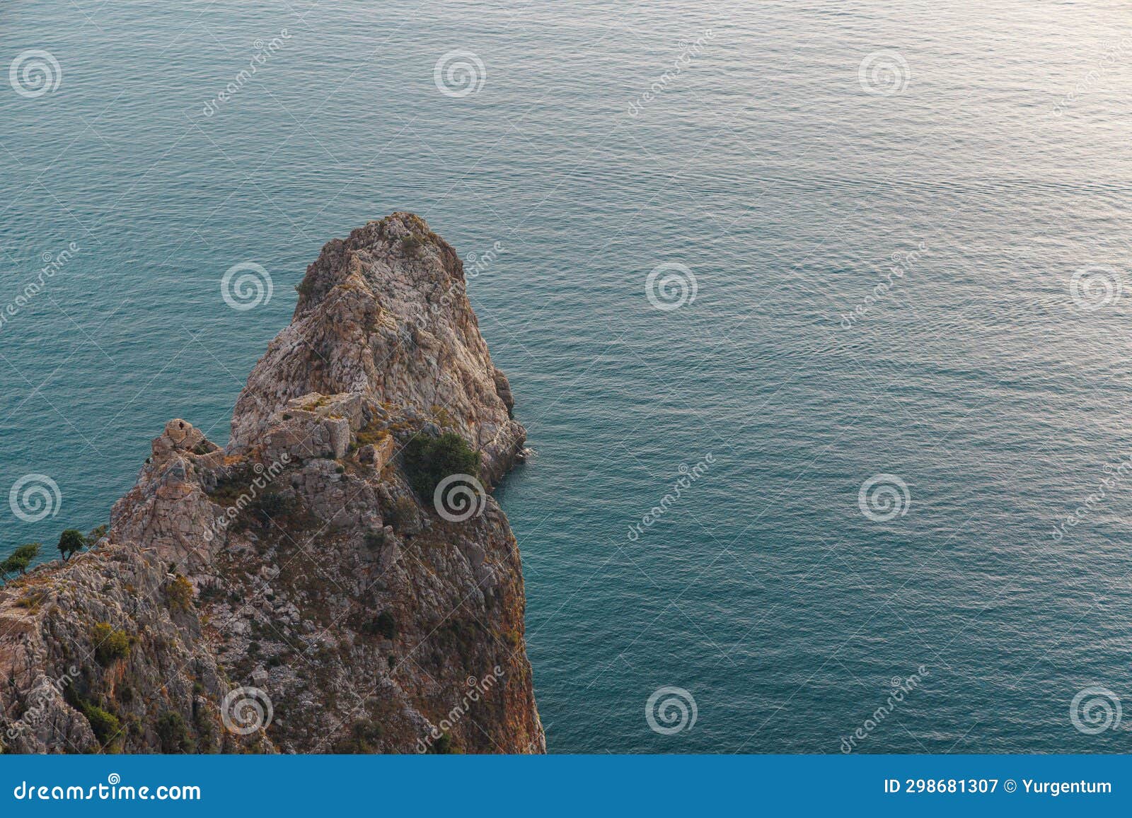 Rock Jutting Out into the Sea Stock Image - Image of rugged, shoreline ...