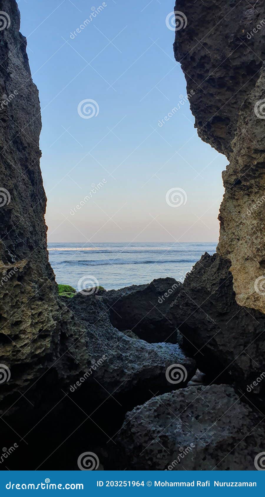 The Rock that Made Up the Window To See the Beach Stock Photo - Image ...
