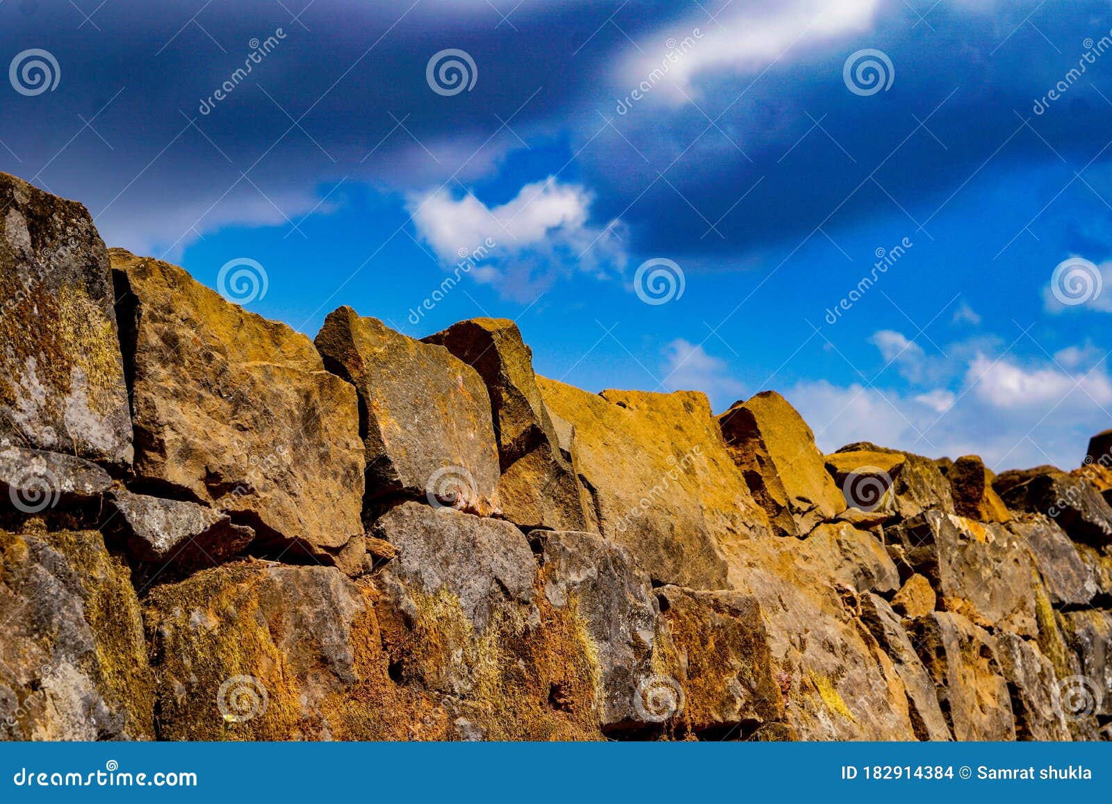 Rock mountain and sky stock photo. Image of wilderness - 182914384