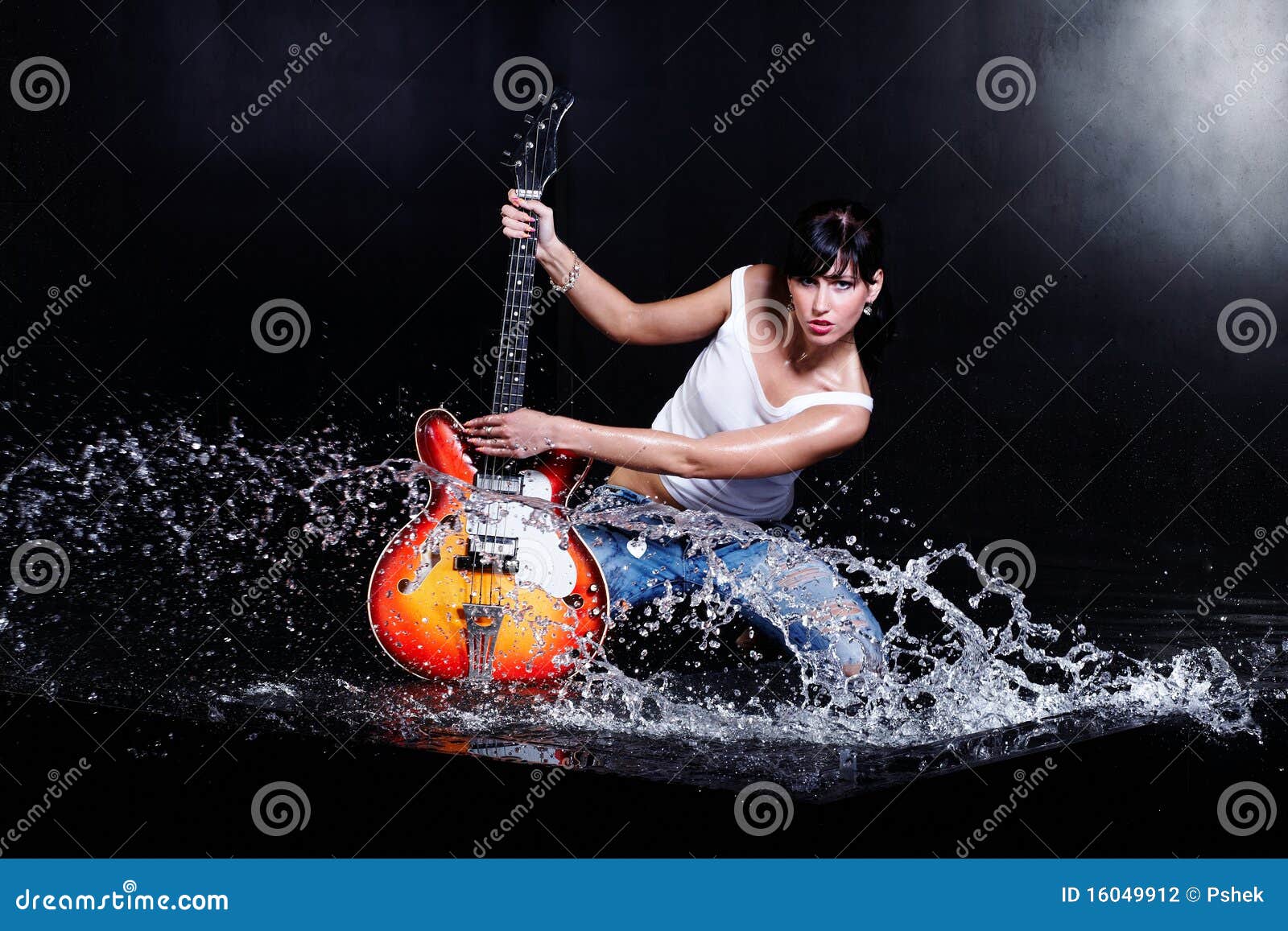 Rock-n-roll Girl Playing a Guitar Stock Photo - Image of jeans, dark ...
