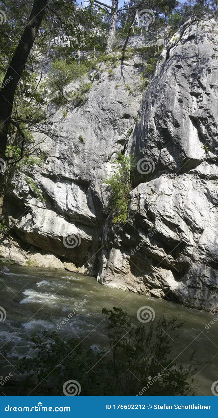A rock near the river stock photo. Image of outcrop - 176692212