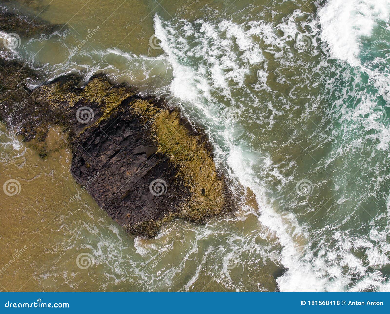 Rock in the Ocean, with a Beach and Sand. Top View, Waves, Natural ...