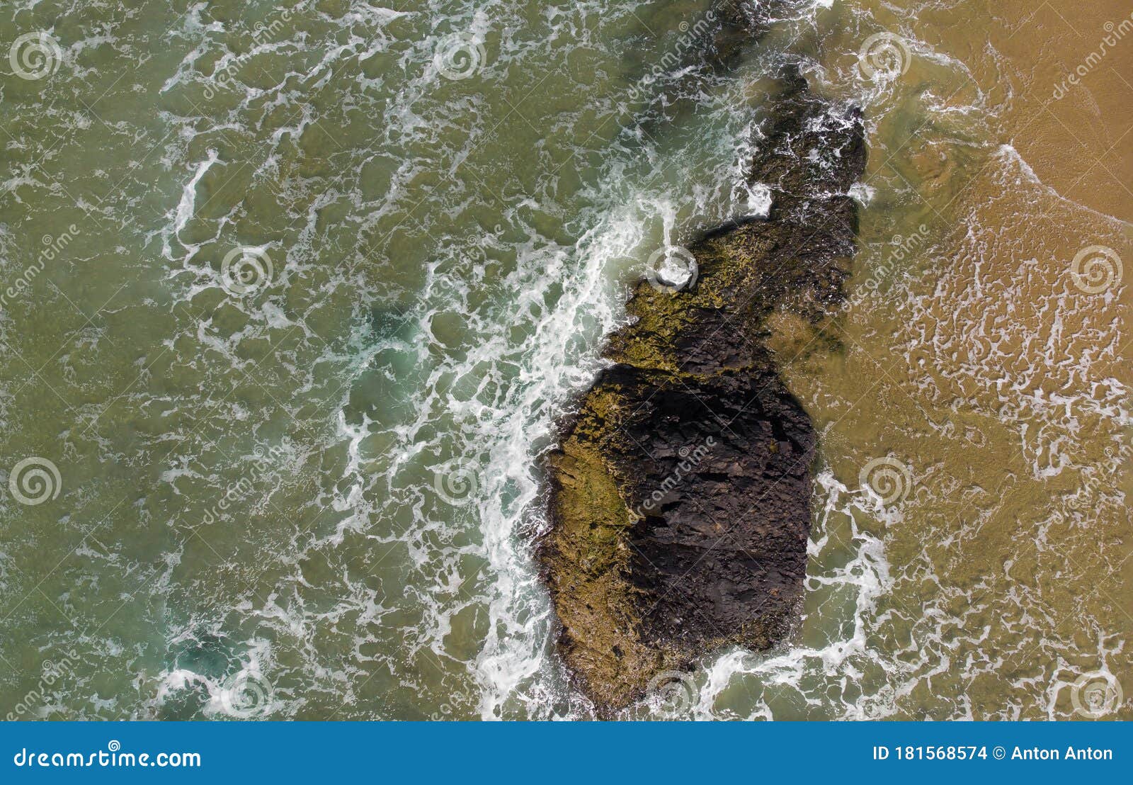 Rock in the Ocean, with a Beach and Sand. Top View, Waves, Natural ...