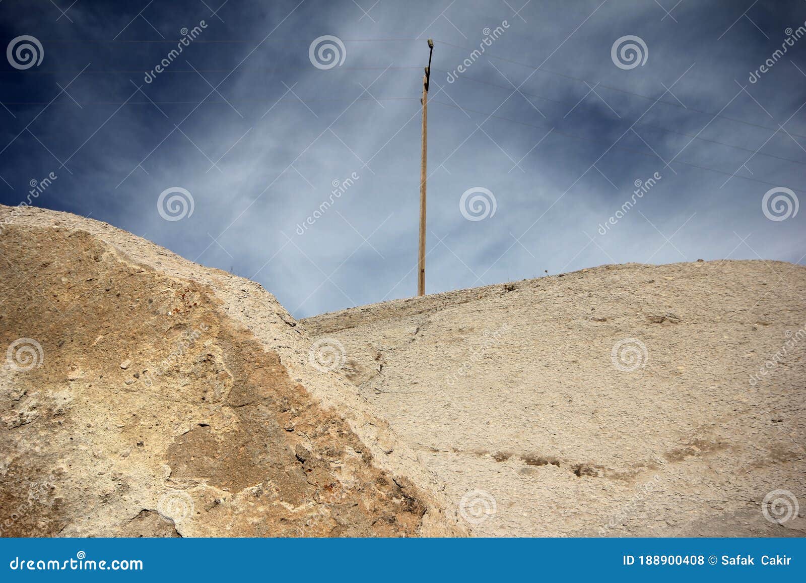 Rock and old electric pole stock photo. Image of danger - 188900408