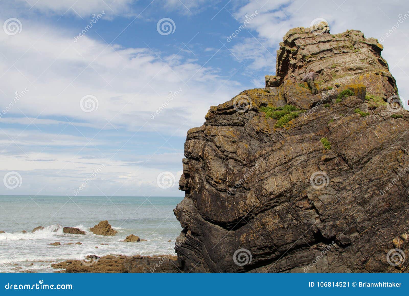 A rock outcrop on a beach stock image. Image of seascape - 106814521