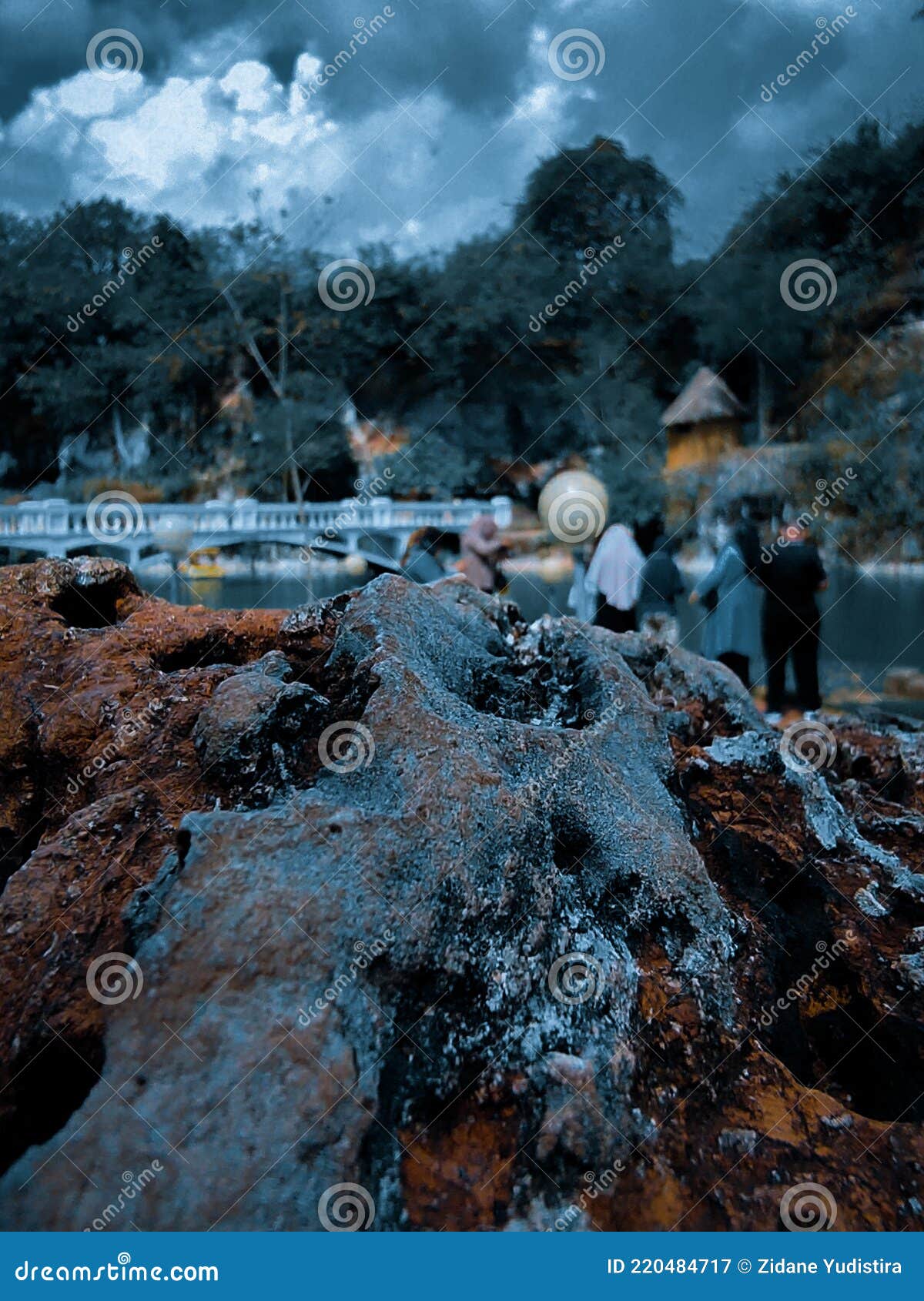 The rock and the people stock image. Image of blue, rock - 220484717