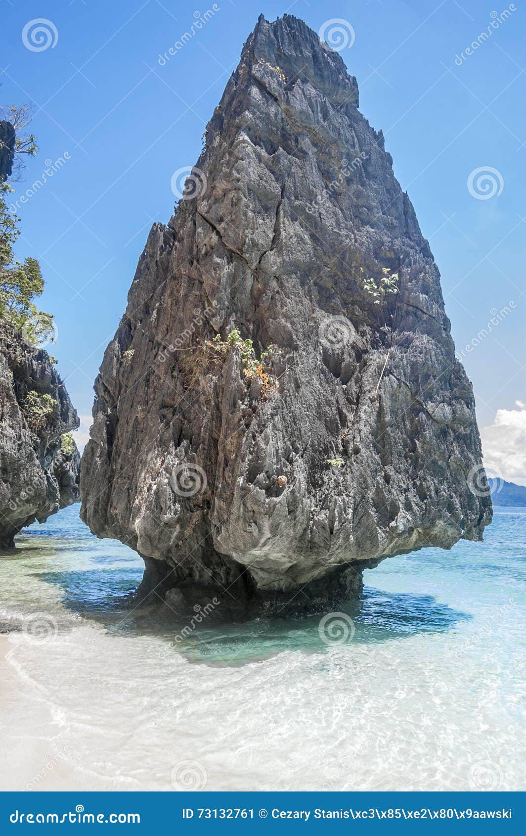 Rock in the philippines stock image. Image of clouds - 73132761