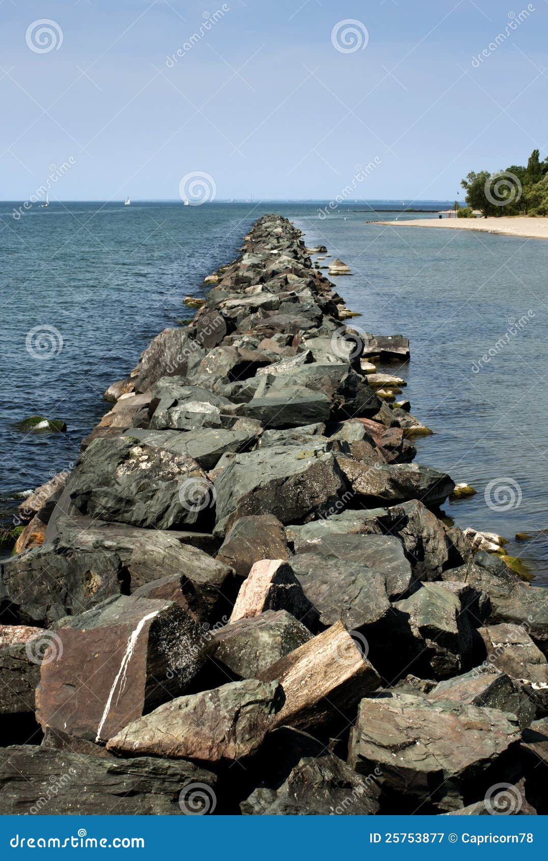 Rock pier on lake stock image. Image of coast, lake, sunlight - 25753877