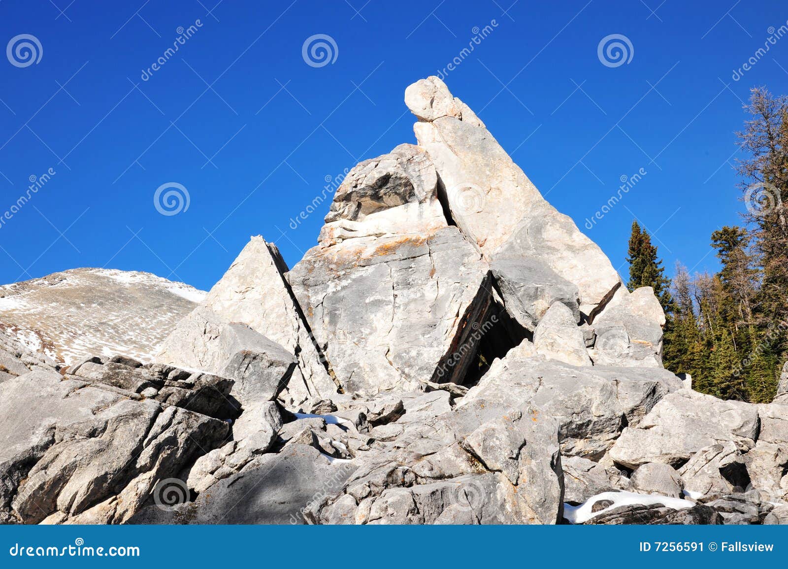 Rock piles and mountains stock image. Image of rockies - 7256591