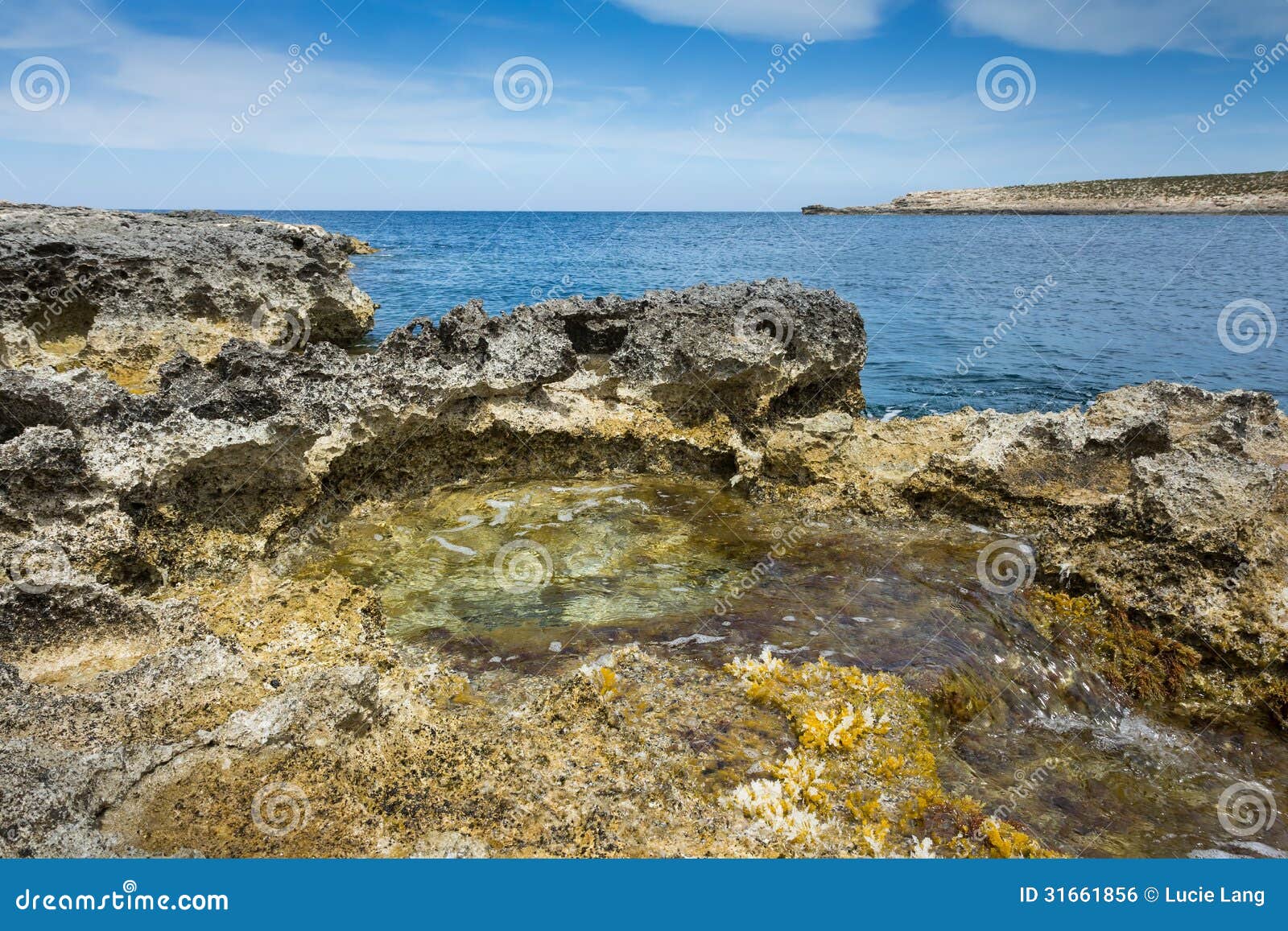 Rock pool by the sea stock photo. Image of stones, blue - 31661856