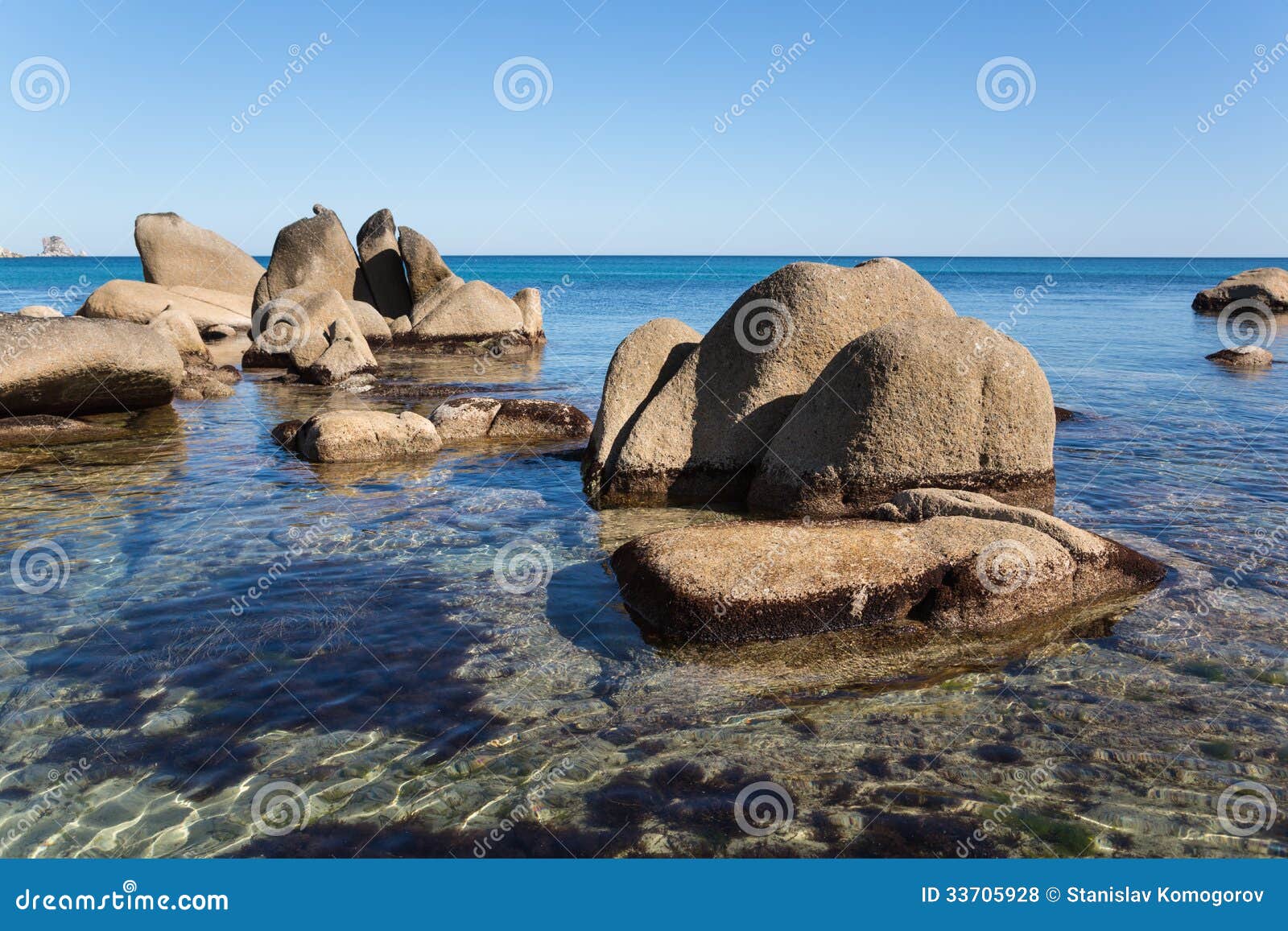 Rock Protruding from the Sea. Stock Photo - Image of seashore, horizon ...