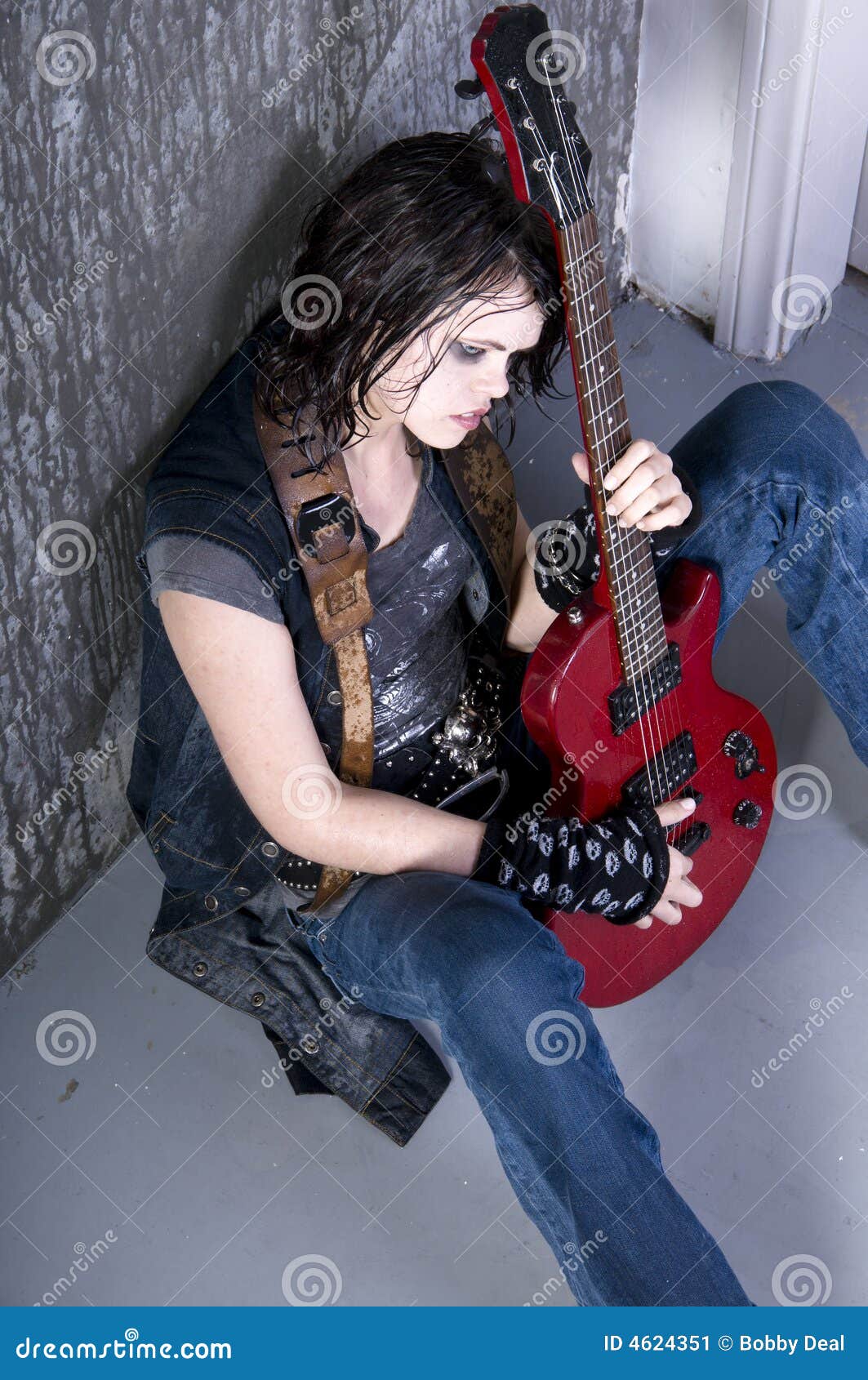 Rock in the Rain stock image. Image of vest, hair, musician - 4624351