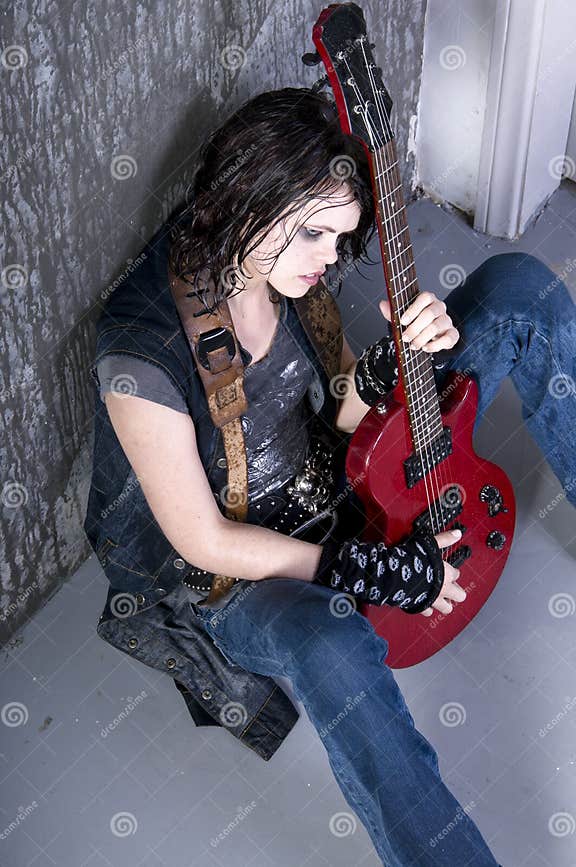 Rock in the Rain stock image. Image of vest, hair, musician - 4624351