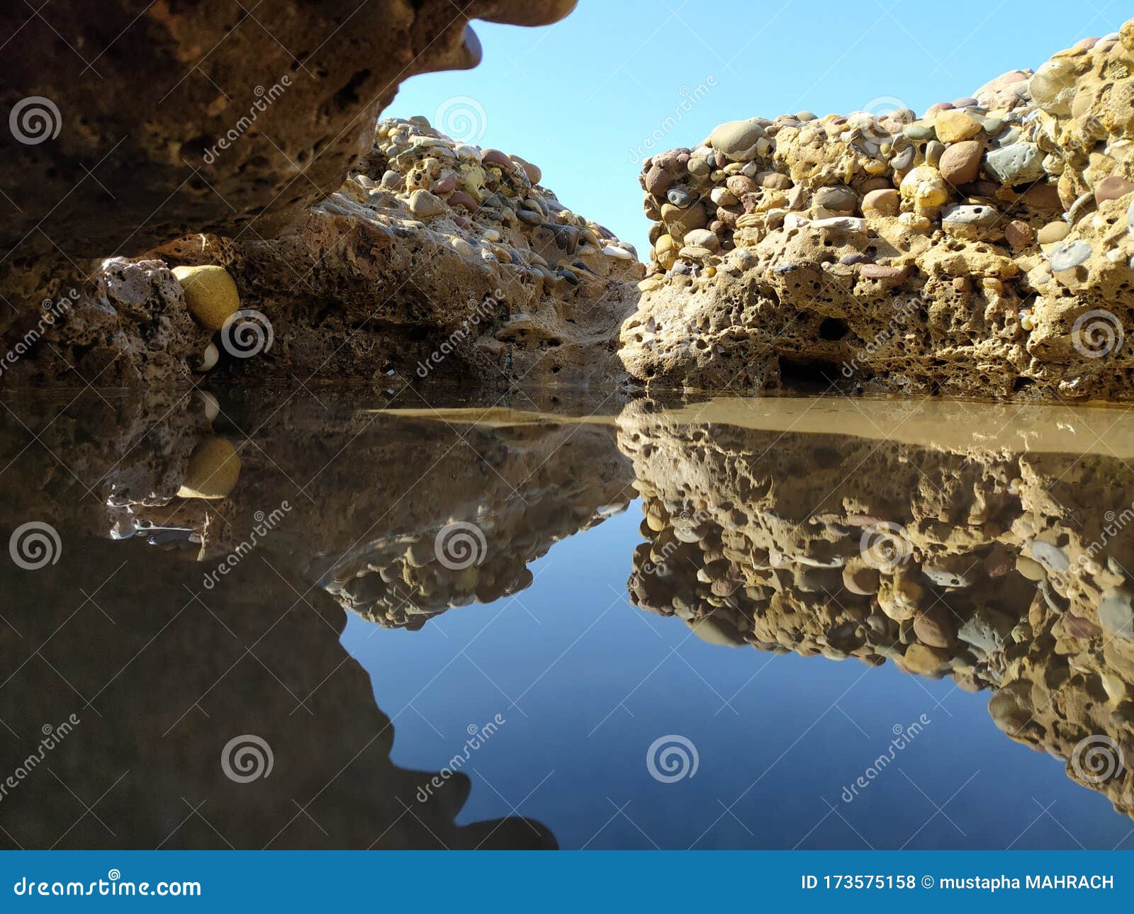The Rock Reflection on the Water Surface Stock Photo - Image of surface ...