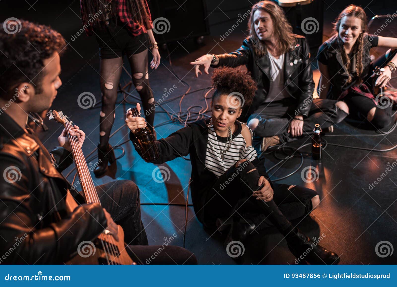 Rock and Roll Band Drinking Beer after Concert on Stage Stock Photo ...