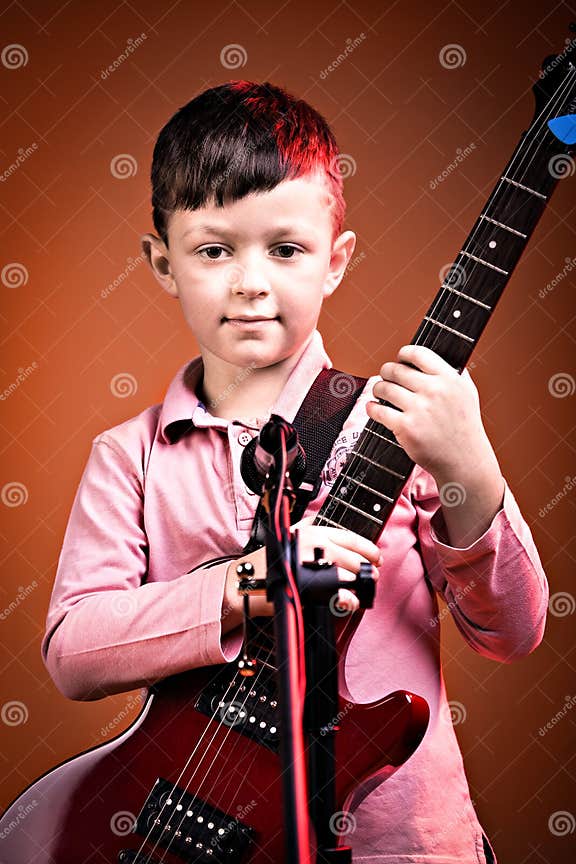 Rock and Roll boy stock image. Image of kids, musician - 24391247