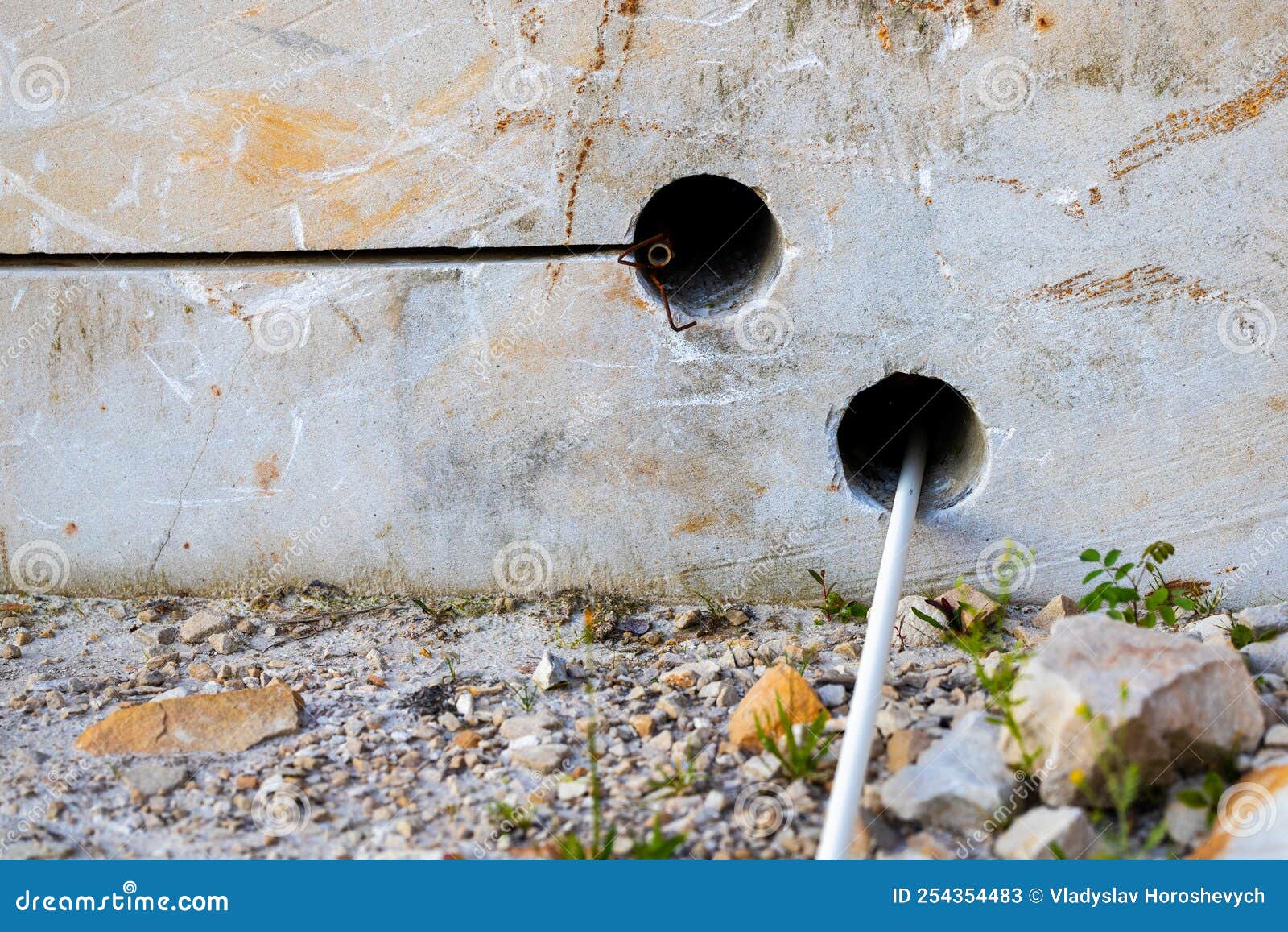 Rock with Round Holes for Laying Explosives, Setting Dynamite in the ...