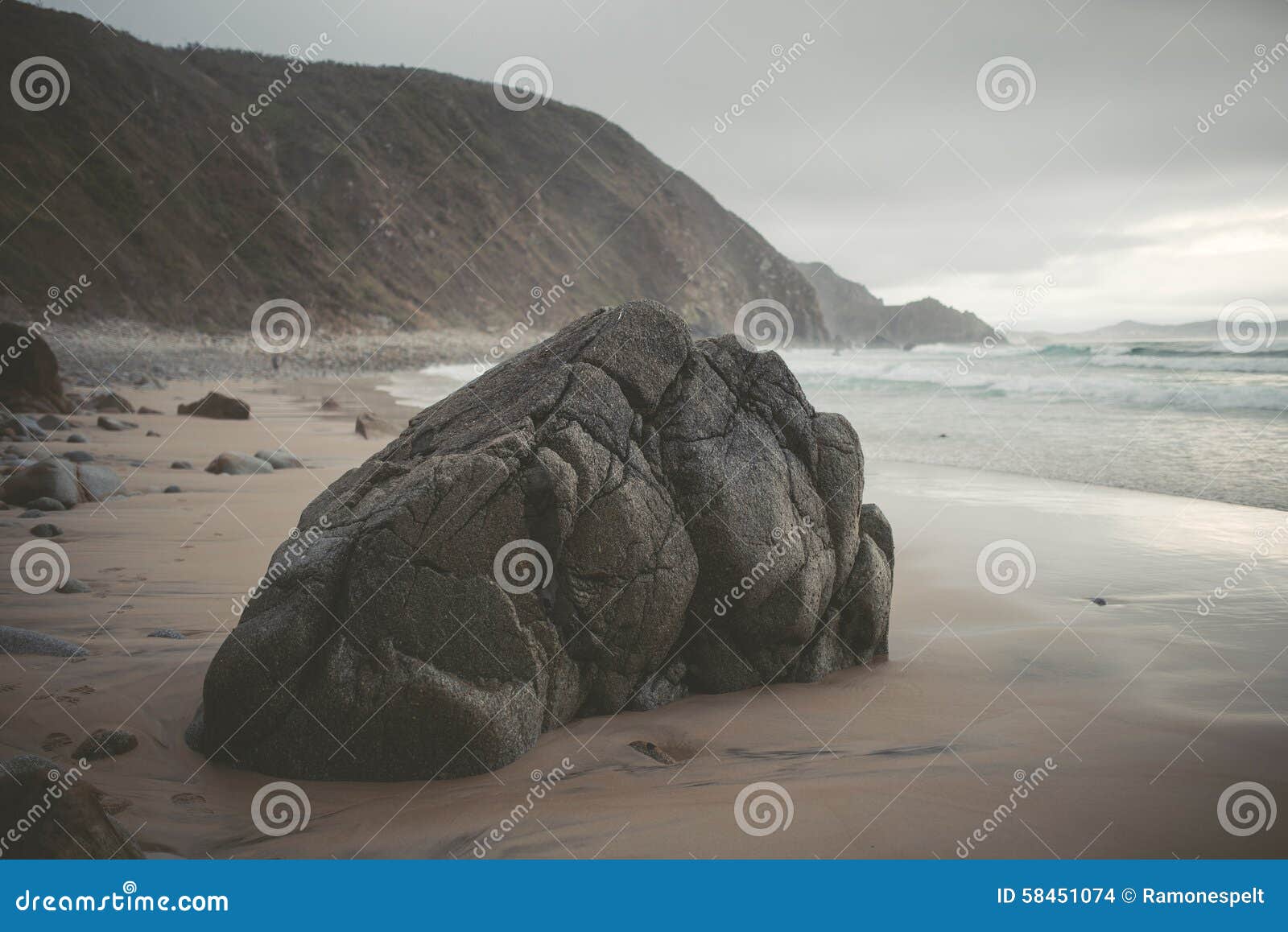Rock in the sand stock photo. Image of cloudy, granite - 58451074