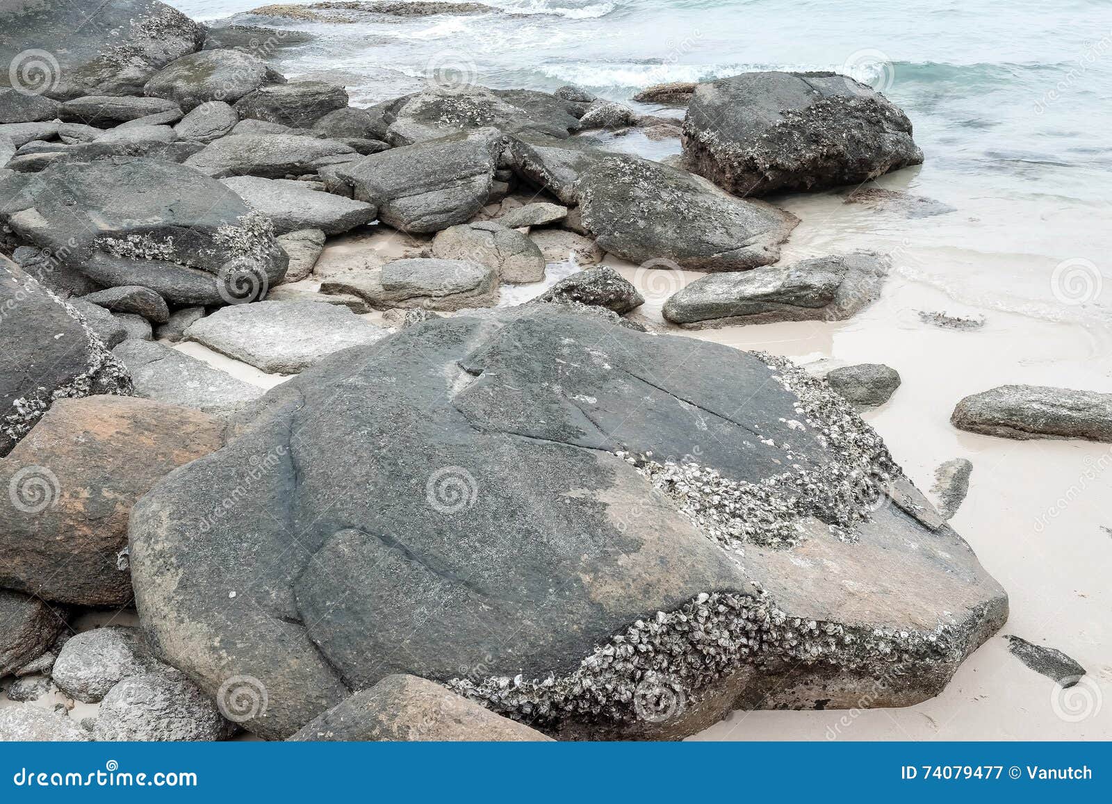 Rock, Sand and Sea stock image. Image of cloud, ocean - 74079477