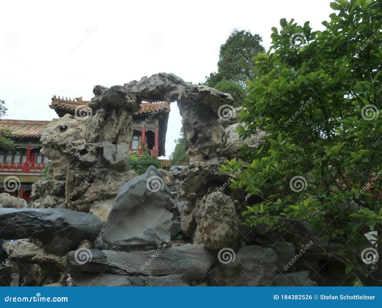 A Rock Sculpture in a Chinese Garden Stock Photo - Image of tree, stone ...
