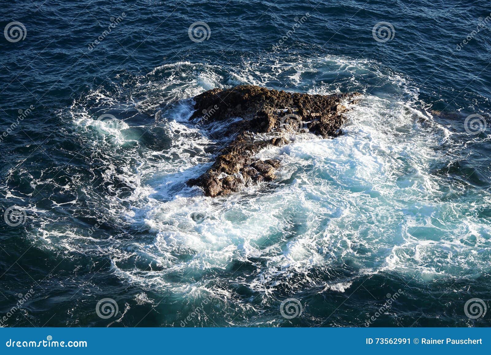 Rock in the sea stock image. Image of waves, splash, ocean - 73562991