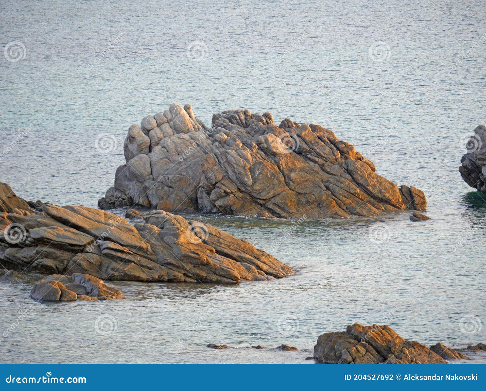 Rock in the sea landscape stock photo. Image of shoreline - 204527692