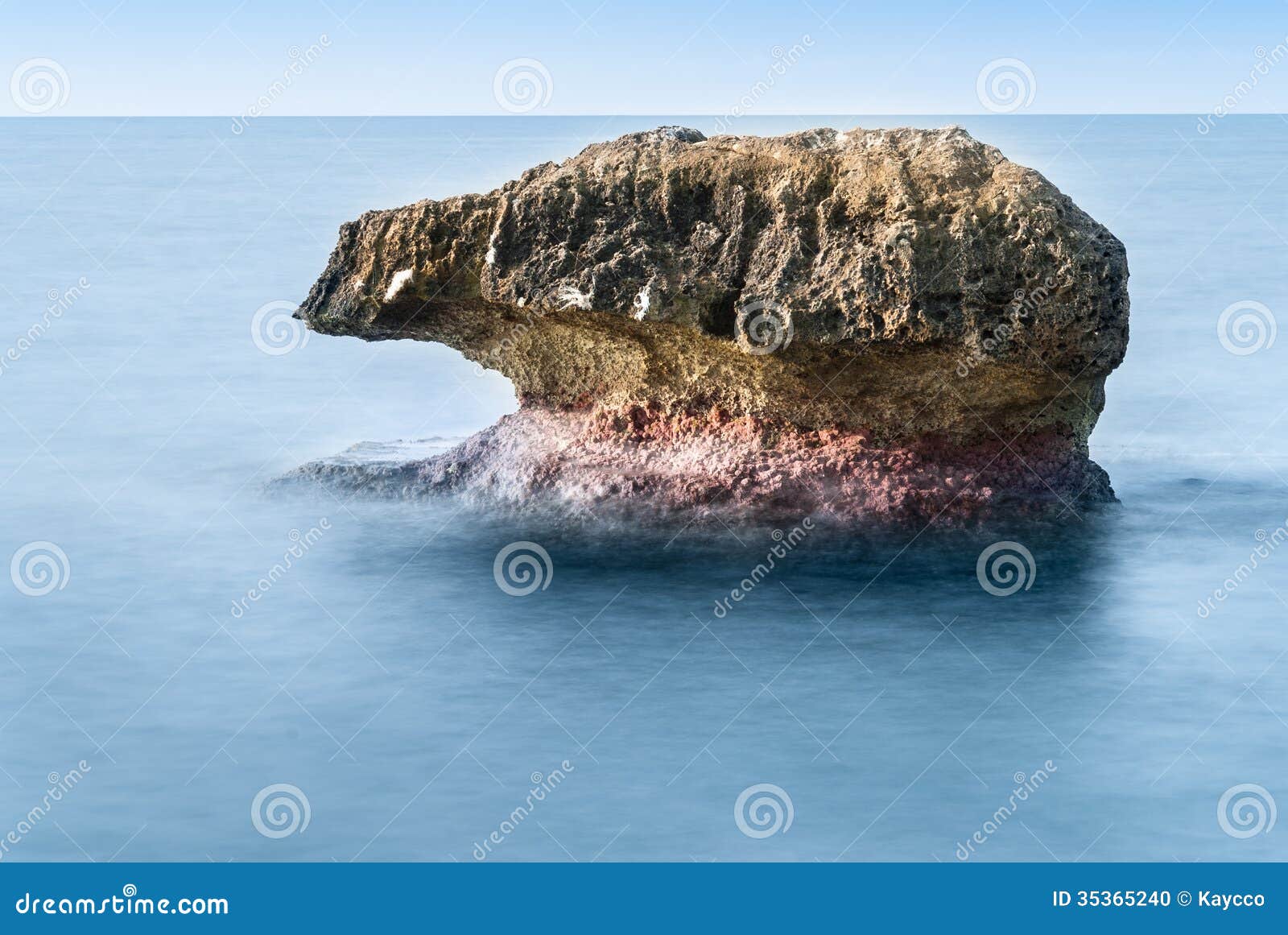 Rock in the sea stock photo. Image of beautiful, horizon - 35365240