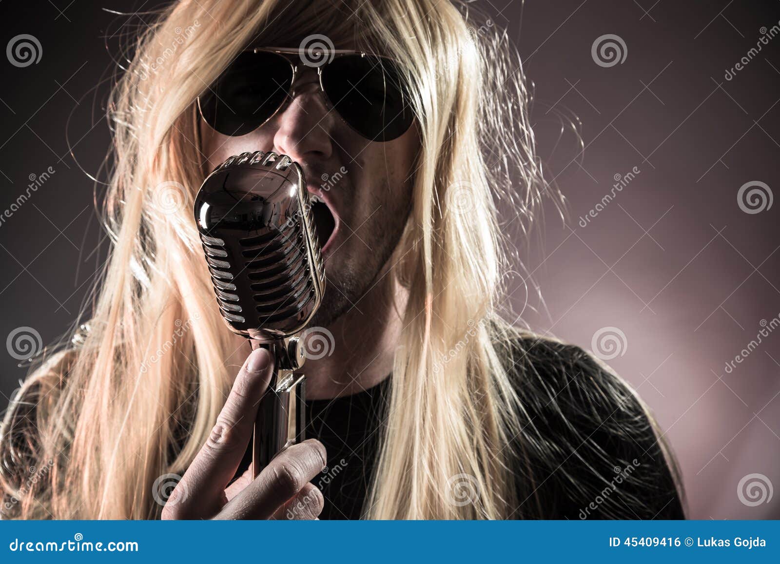 Rock Singer with Retro Microphone Stock Photo - Image of club, glitter ...