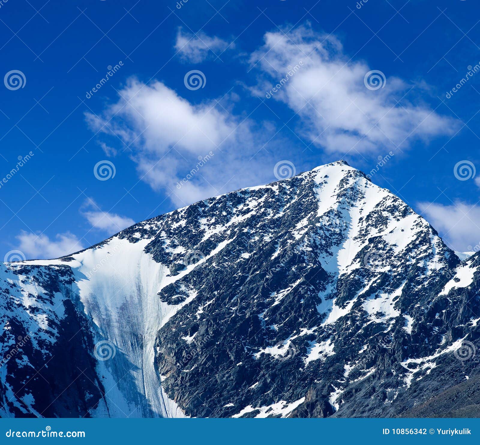 Rock in a snow stock photo. Image of slope, outdoor, cloudscape - 10856342