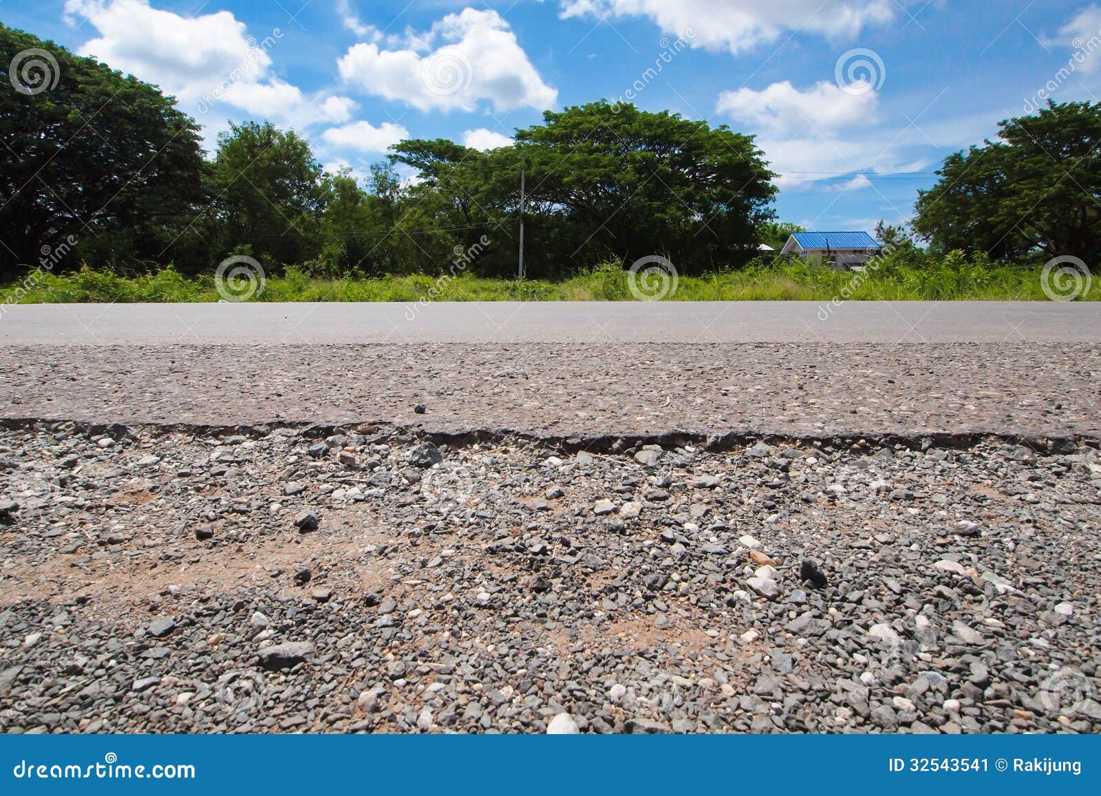 Rock and Soil Material on the Paved Road in the Rural Areas. Stock ...