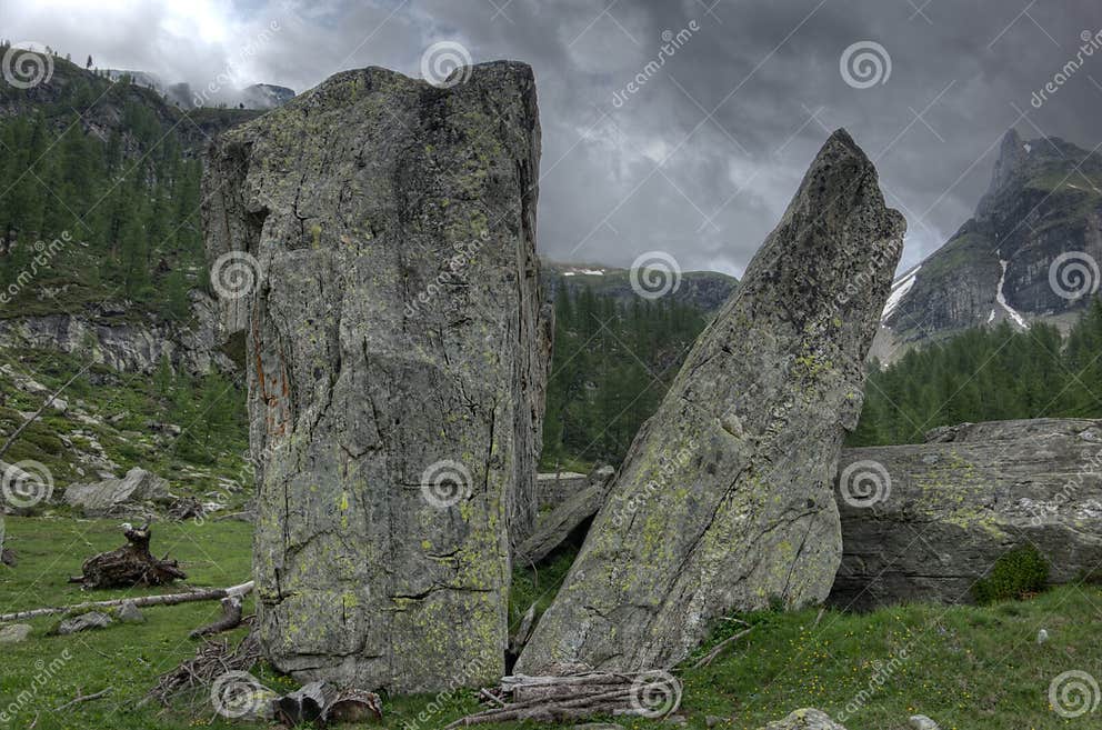 Gigantic rock split in two stock image. Image of geology - 223608885